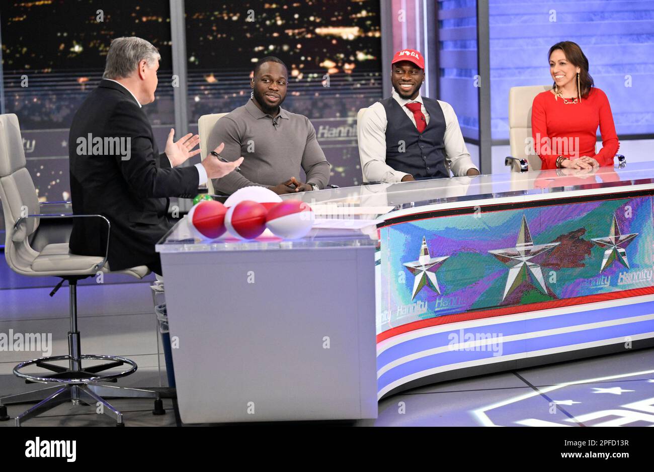 Fox News commentator Sean Hannity, left, interveiws brothers Abimbola ...