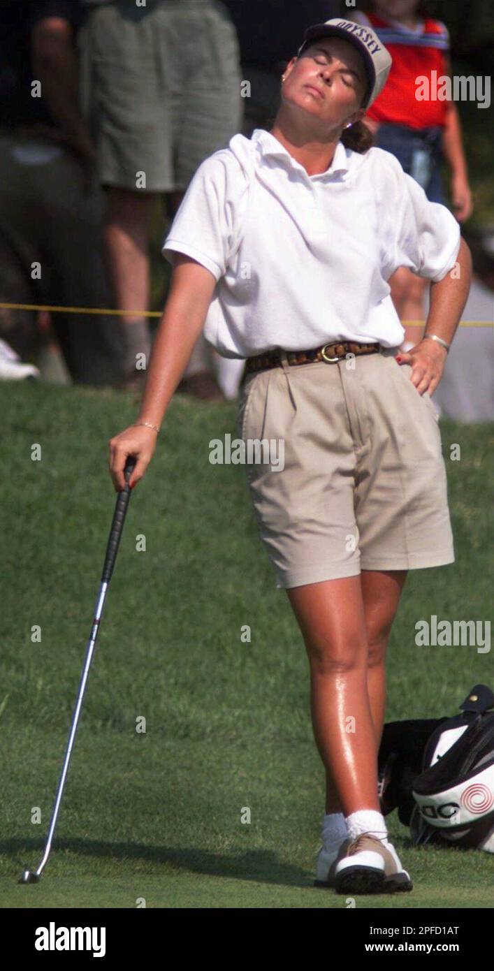 Lisa Kiggens gathers herself before putting on the 18th hole Friday ...