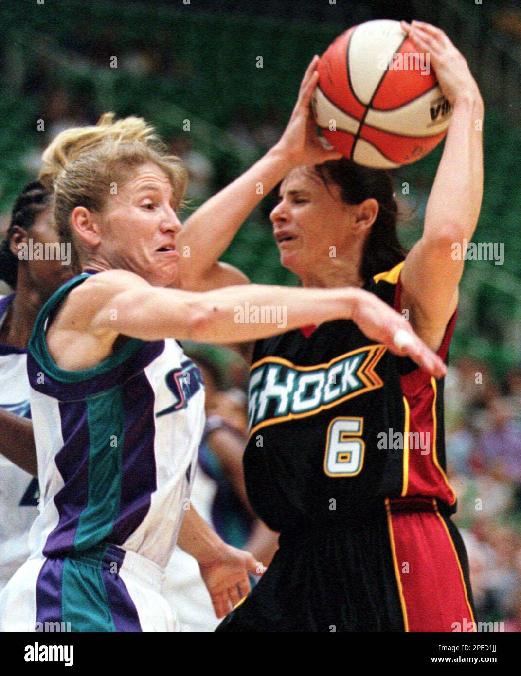 Utah Starzz guard Debbie Black, left, swats at the ball as Detroit ...