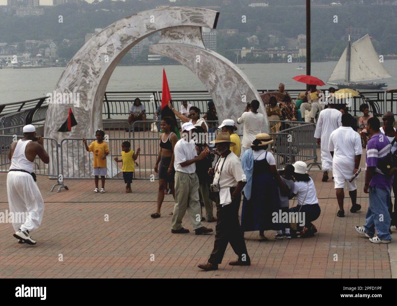 Spectators gather before the blessing ceremony of the Middle Passage ...