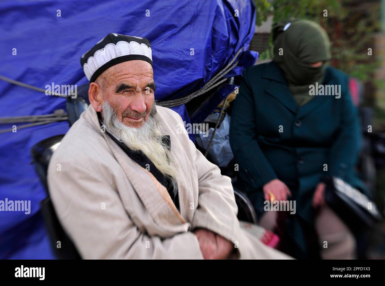 Portrait of an Uyghur man taken in the old city of Kashgar, Xinjiang ...