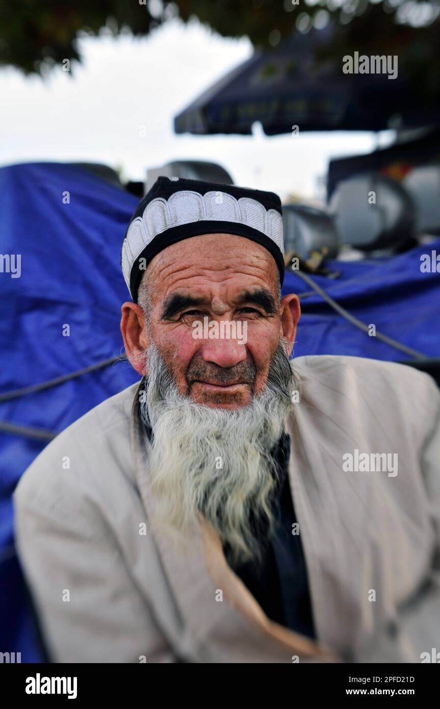 Portrait of an Uyghur man taken in the old city of Kashgar, Xinjiang ...