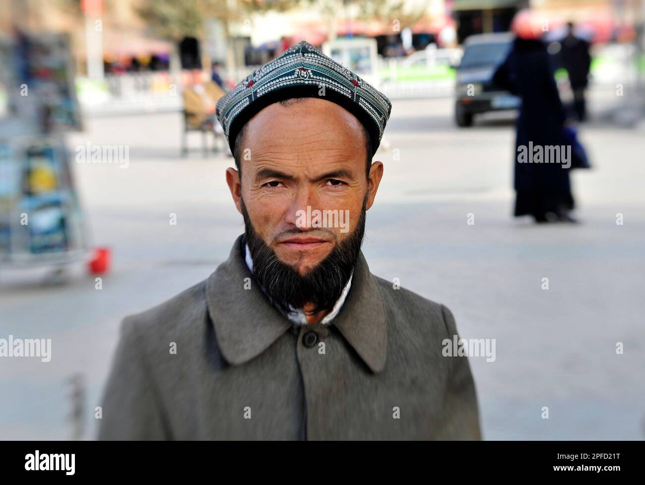 Portrait of an Uyghur man taken in the old city of Kashgar, Xinjiang ...