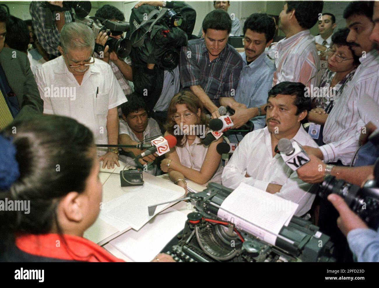 Mario Arnoldo Hernandez Colindres, center right, a Guatemalan banker is ...