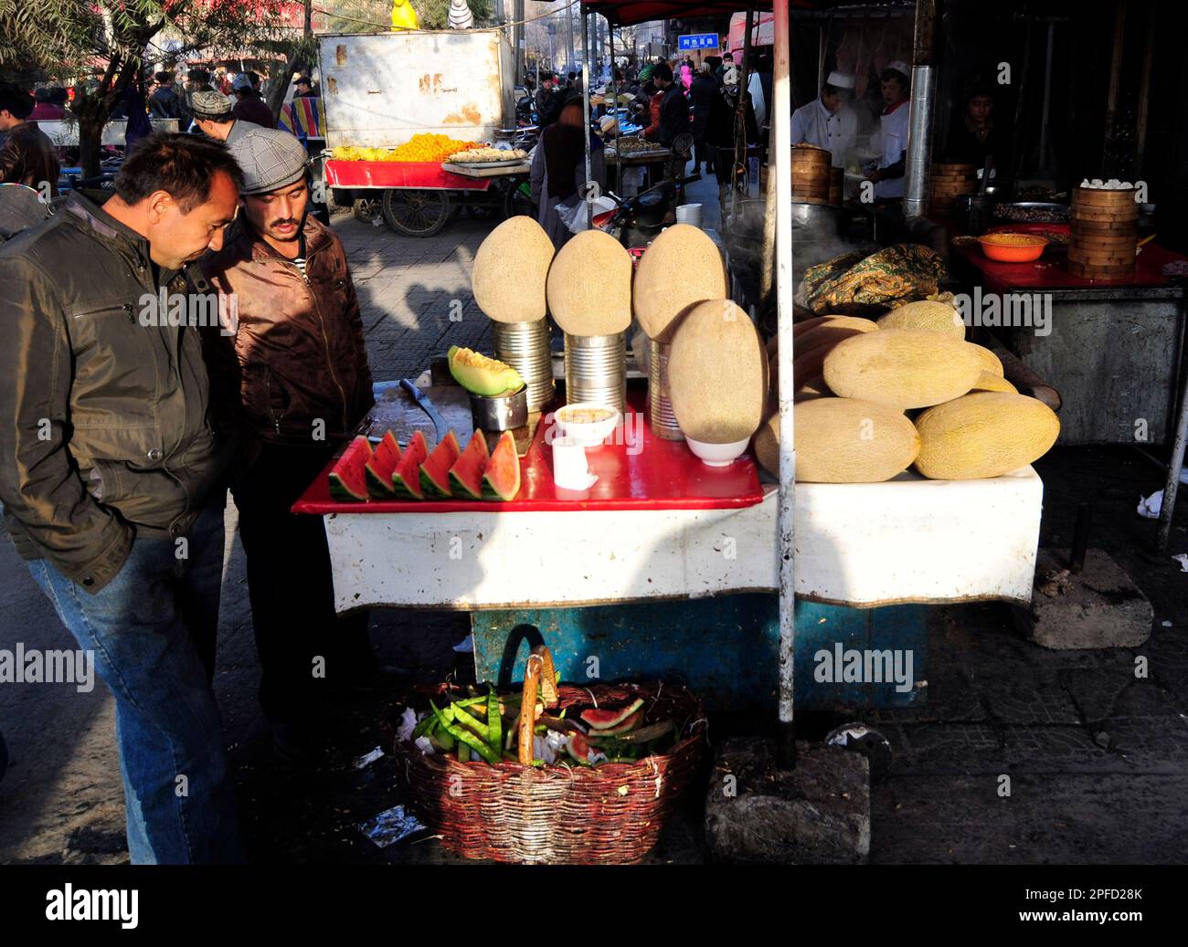 A Melon and Watermelon vendor in the old city in Kashgar, Xinjiang ...