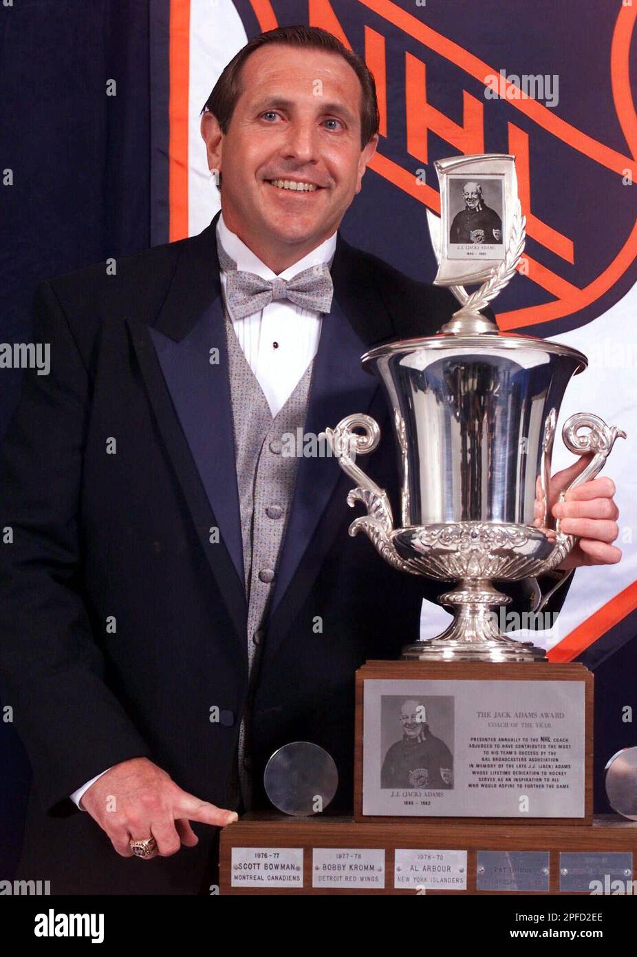 Ottawa Senators coach Jacques Martin poses with the Jack Adams Award ...