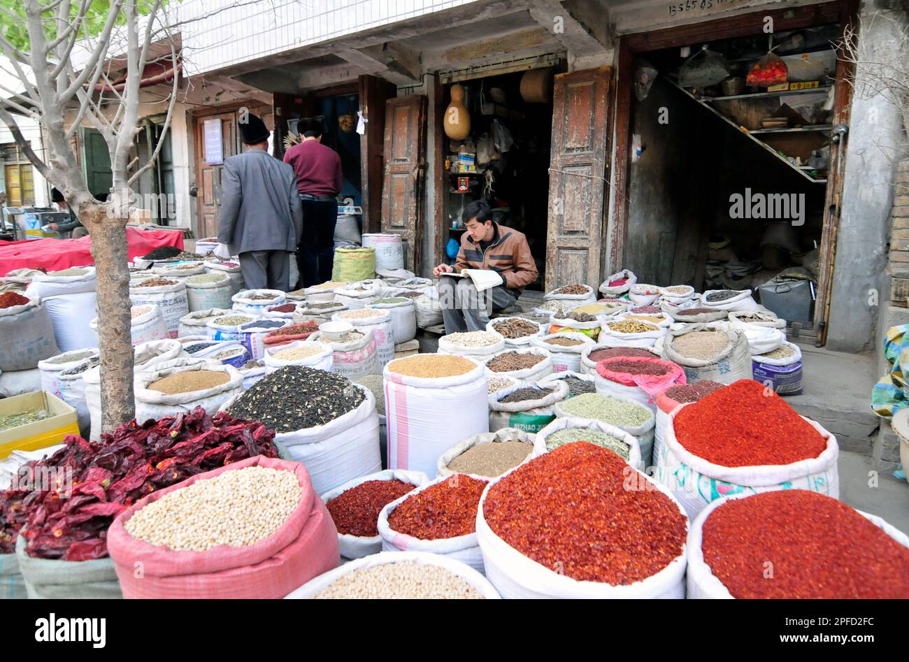A colorful spice shop in the old city of Kashgar, Xinjiang, China Stock ...