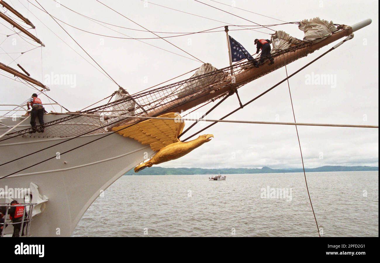 Permanent crew members and U.S. Coast Guard Academy cadets do touch-up ...