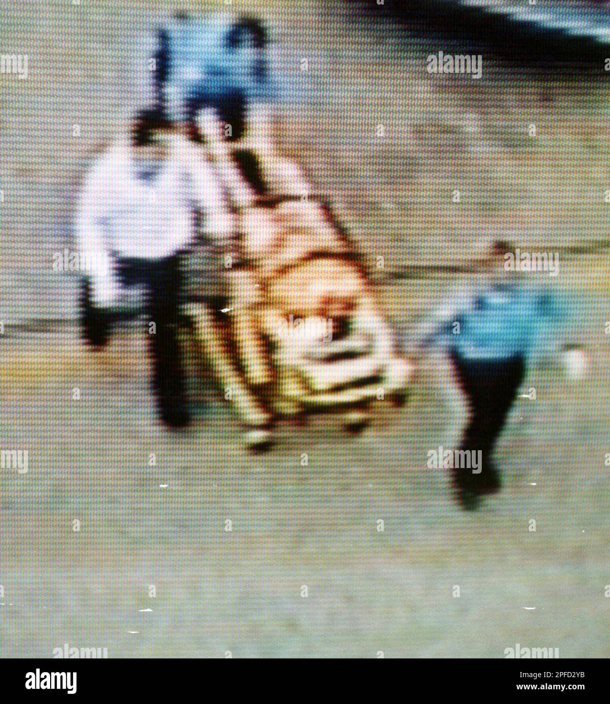 Emergency personel roll a stretcher carrying former nurse-turned-gunman ...