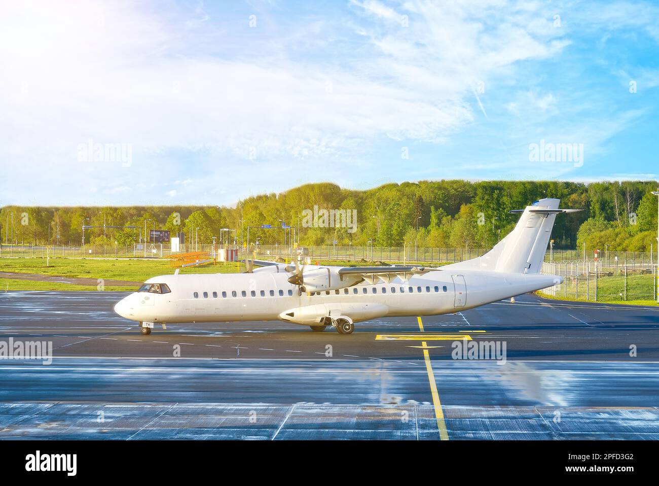 aircraft on runway preparing for takeoff at the airport. Preparation of ...