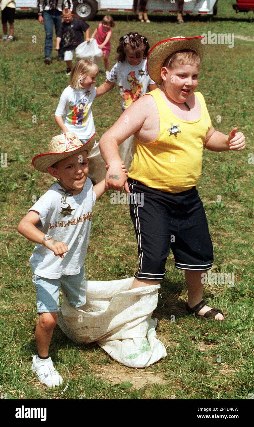 Make-A-Wish child Chris Staub, 11, right, and his 6-year-old brother ...