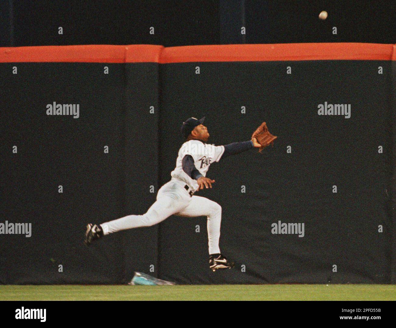 San Diego Padres' centerfielder Ruben Rivera leaves the ground while ...