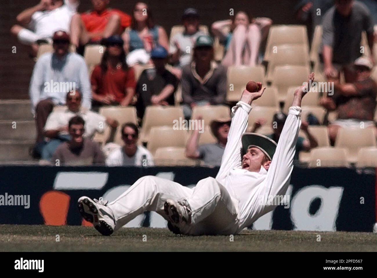 FILE--Australian cricketer Mark Taylor celebrates a spectacular catch ...