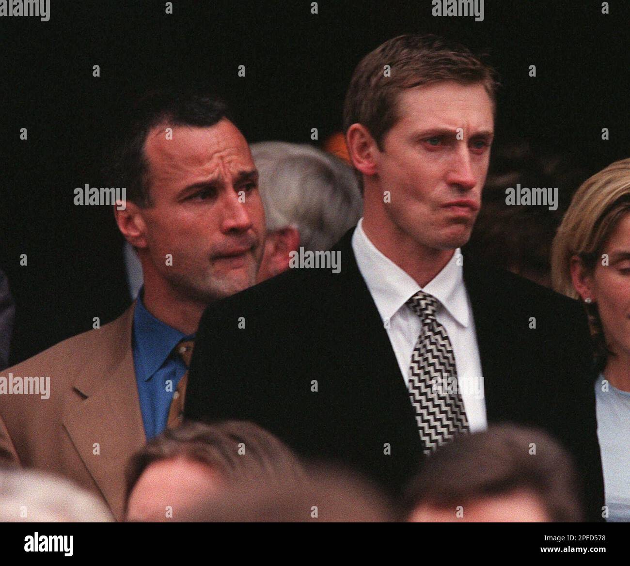 Wayne Gretzky, right, and Paul Coffey, left, leave the funeral for ...