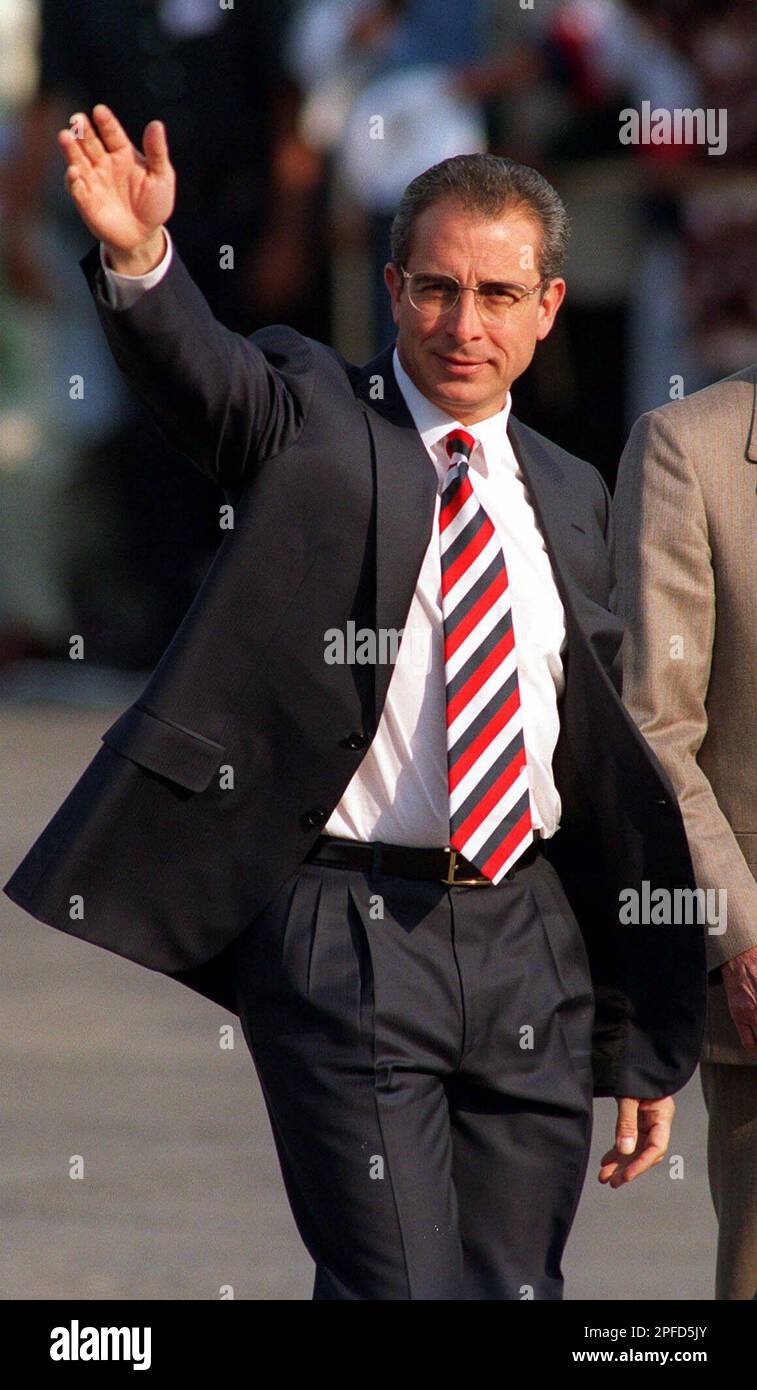 Mexican President Ernesto Zedillo waves to the crowd as he arrives for ...