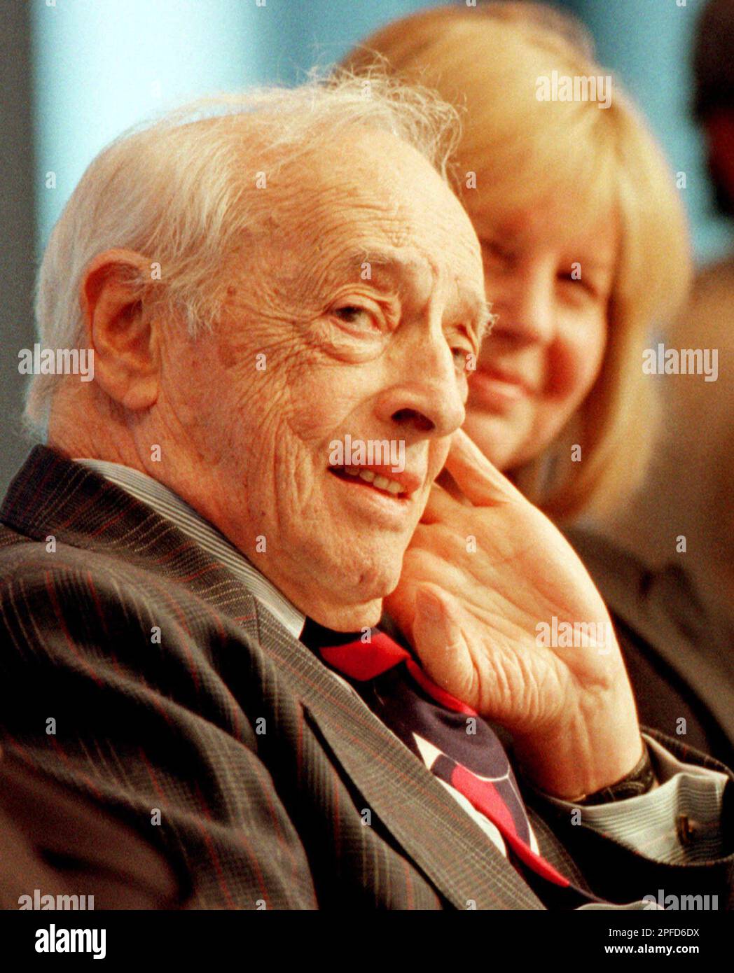 Nobel and Pulitzer Prize winning author Saul Bellow, left, listens to ...