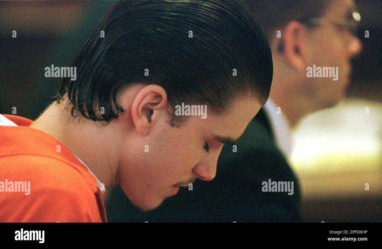 Jason Halda lowers his head during his sentencing hearing in Manitowoc ...