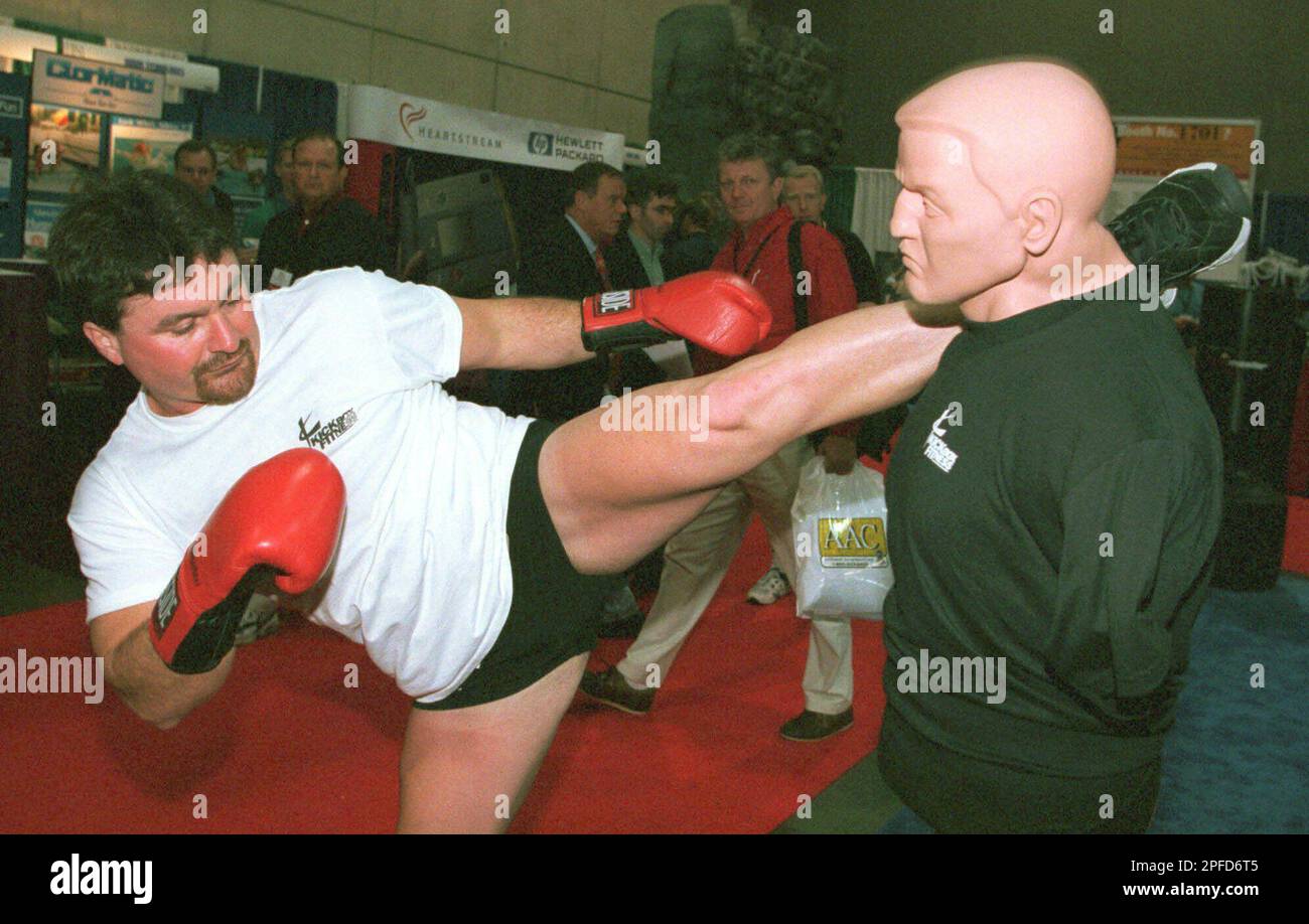 John Maynard demonstrates a kickboxing workout on a "BOB" which stands ...