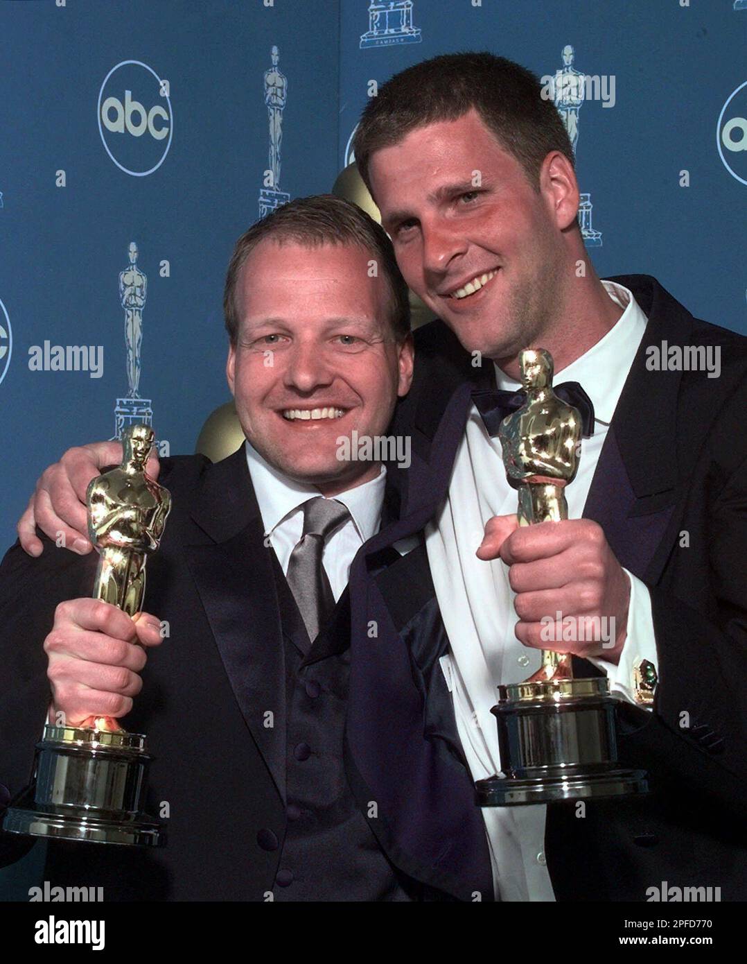 Kim Magnusson, left, and Anders Thomas Jensen pose with their Oscars ...
