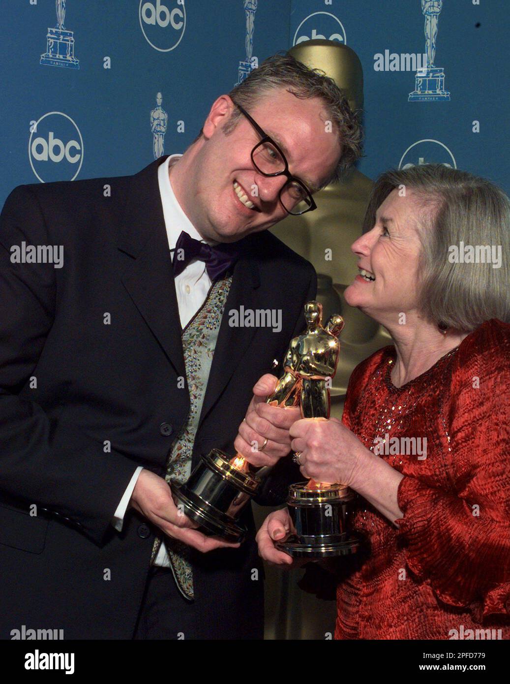 Martin Childs and Julie Quertier smile after receiving the Oscar for ...