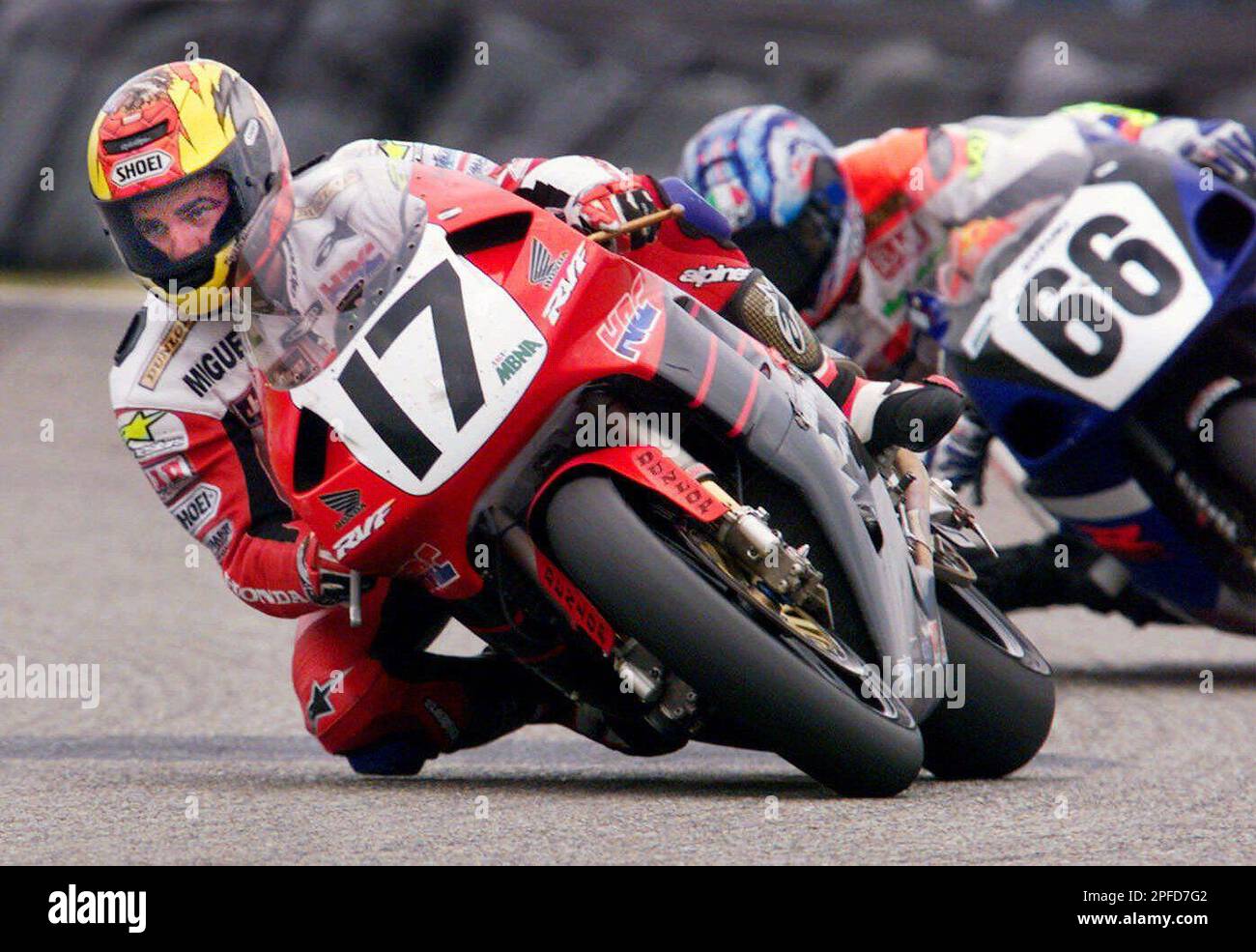 Miguel Duhamel (17) holds his position in front of challenger Matthew ...