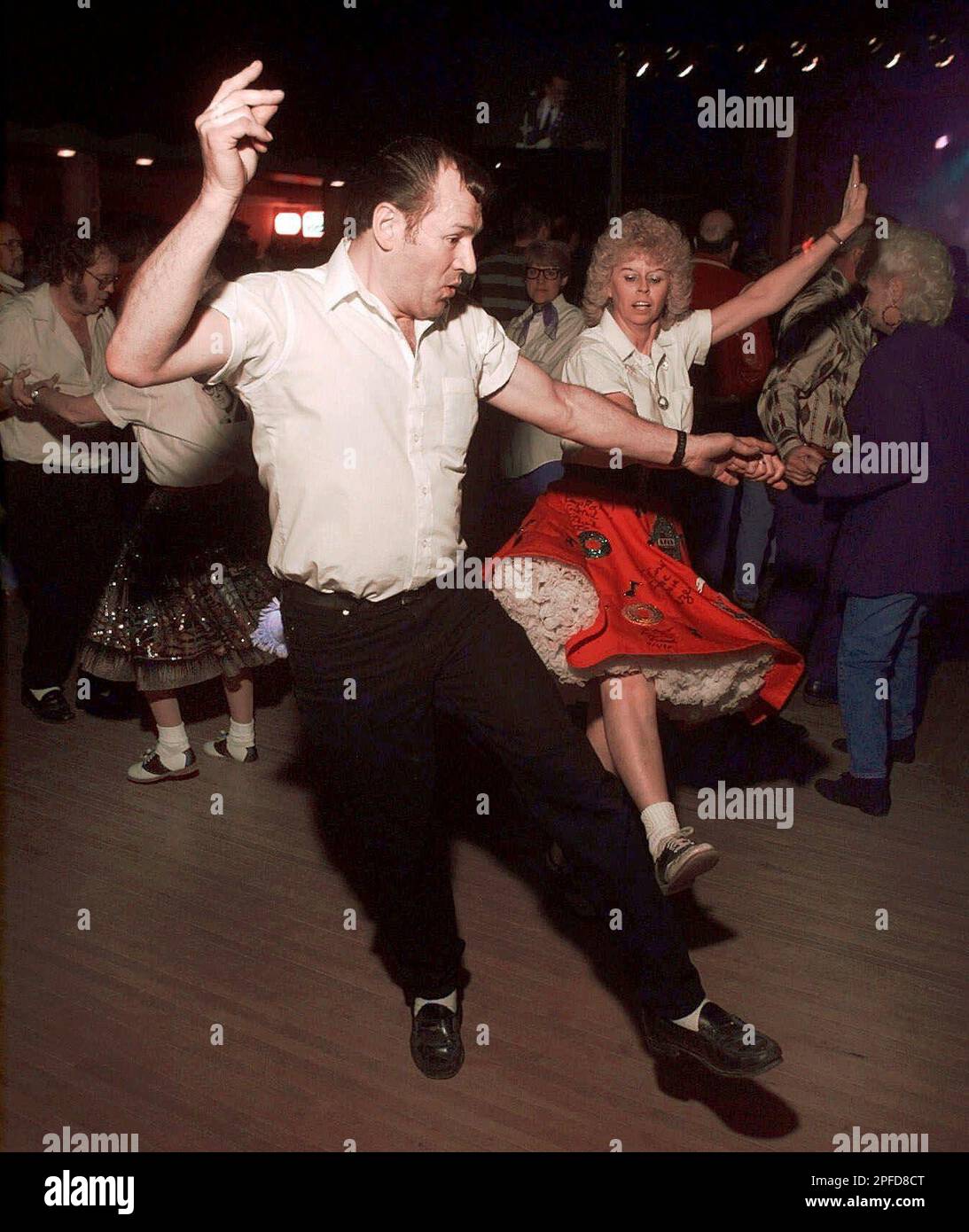 Harold, left, and Carol Geist, of Valley Springs, S.D., dance at the ...