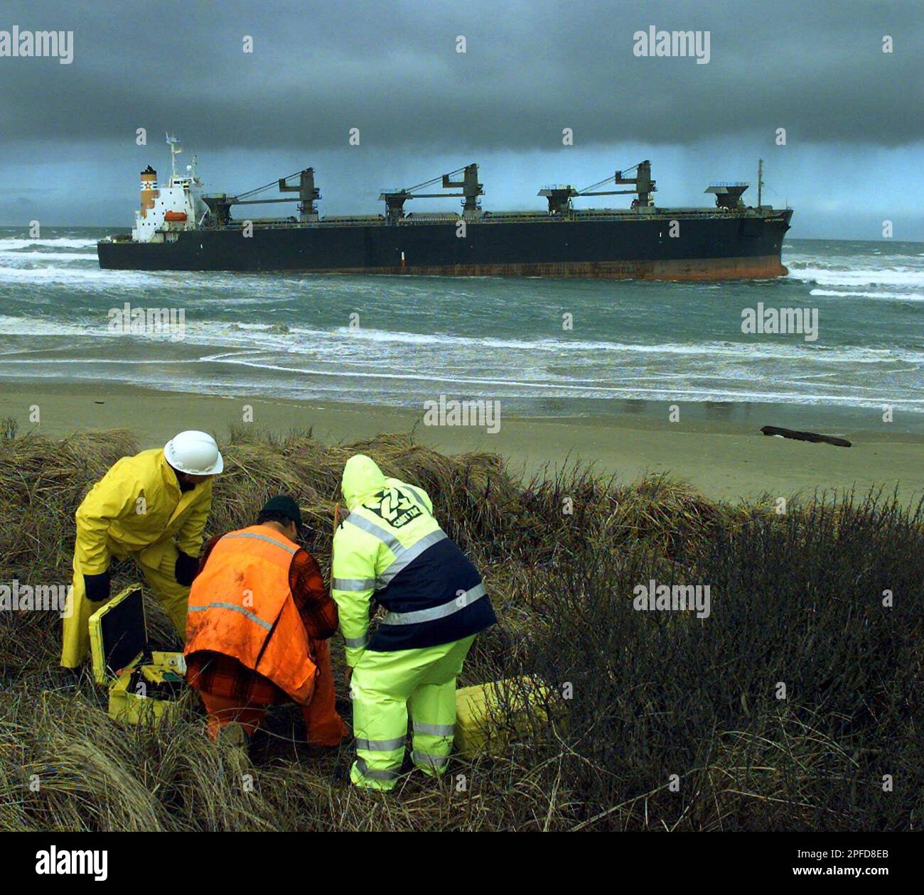 A survey crew uses a global positioning satellite system to determine ...