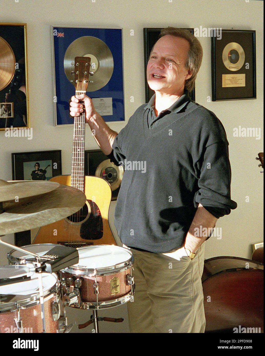 Bobby Vee stands with memorabilia from his early years as a rock 'n ...