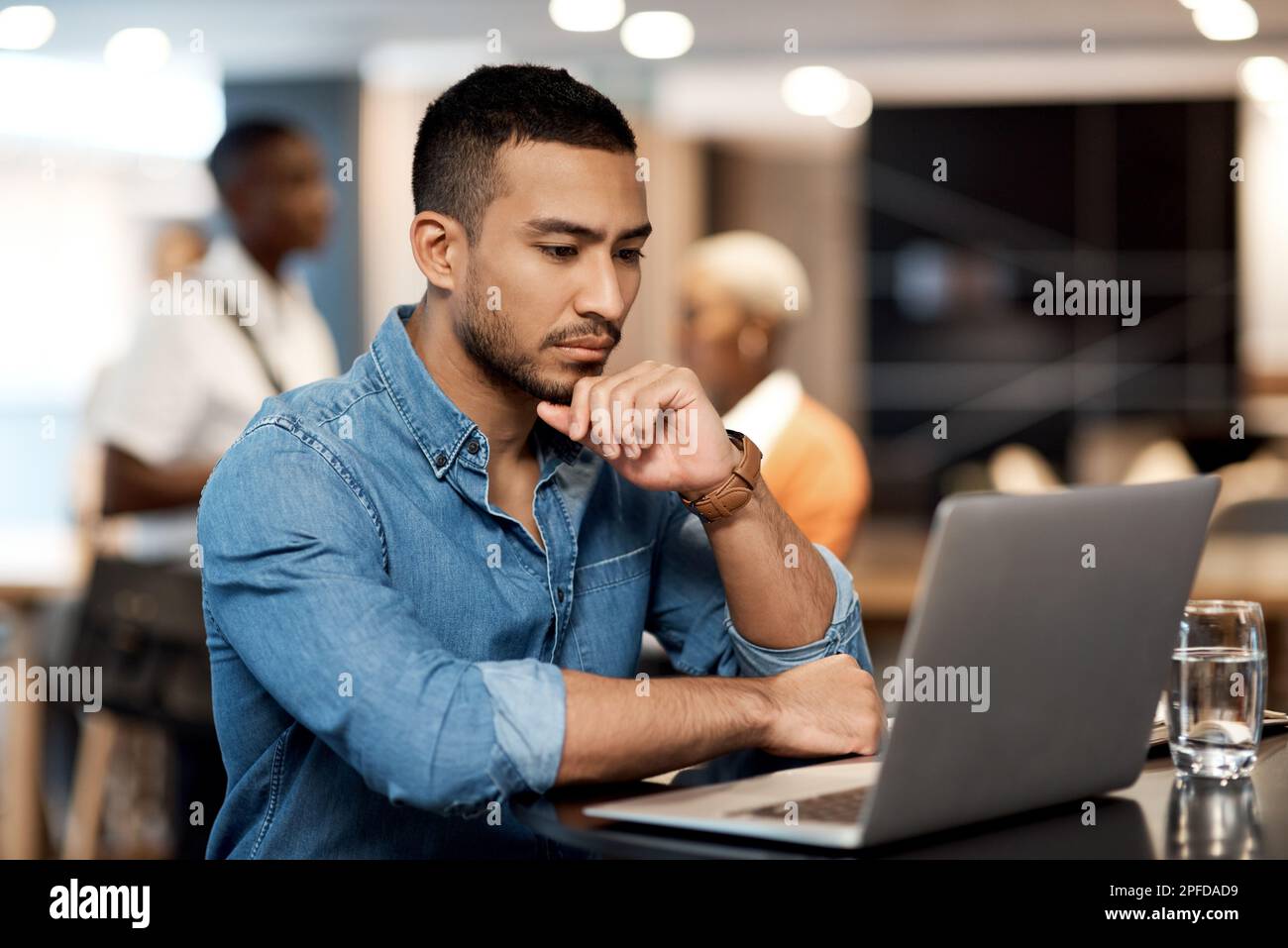 Hes got that hard to find kind of grind. a young businessman using a ...