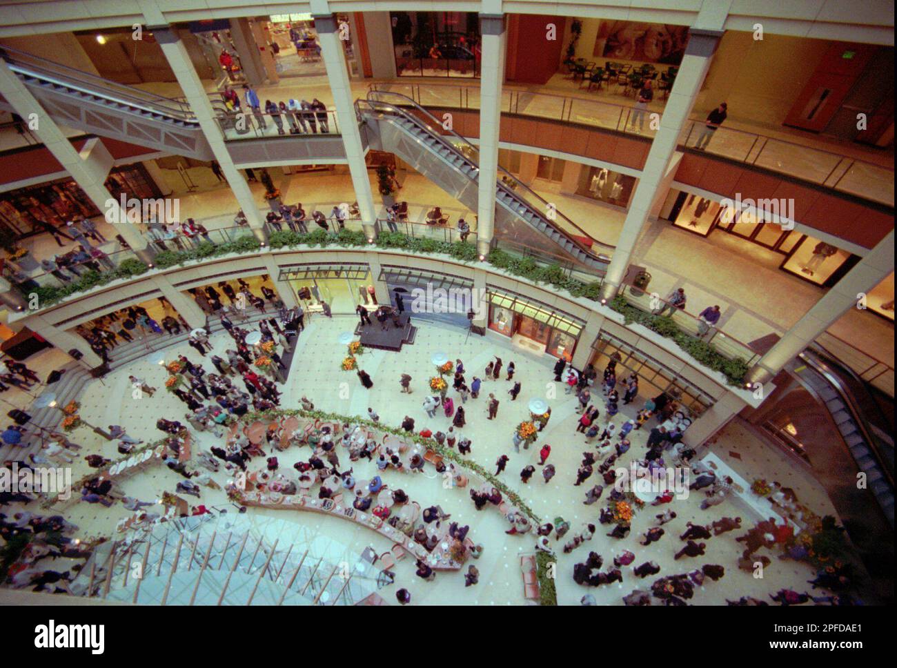 Shoppers inspect Seattle's newest shopping center, Pacific Place, a ...