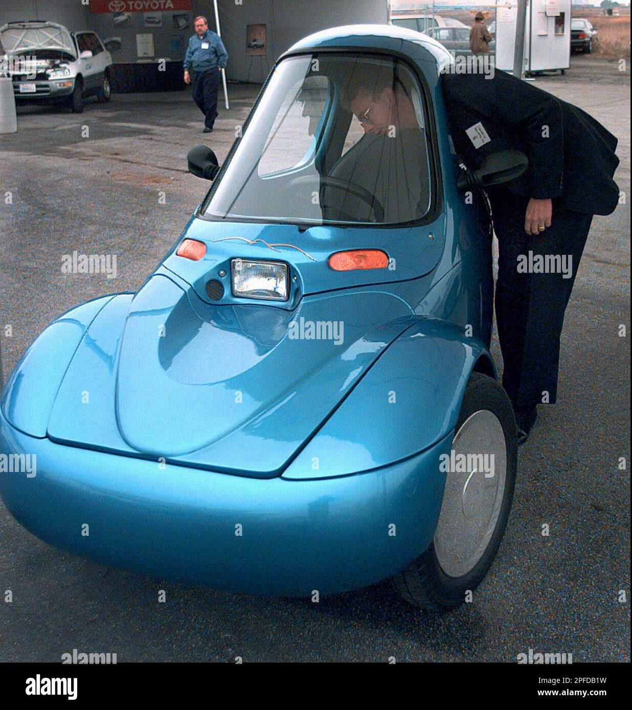 Tim Palmatier pokes his head into a Corbin "Sparrow," a $13,000 one ...