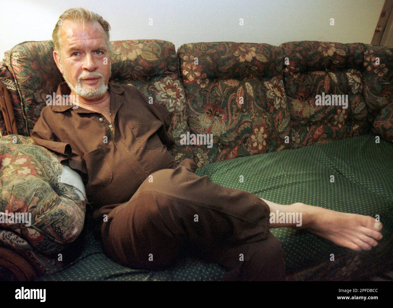 Carrboro resident Marty Ravellette, a man born without arms, poses Oct ...