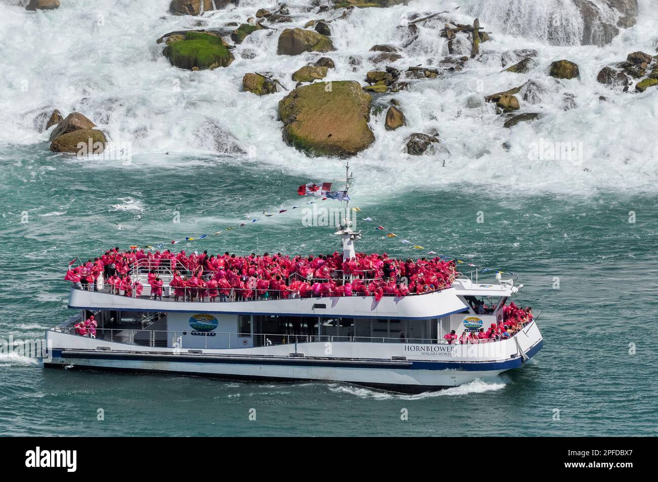 Niagara Falls Town, ON, Canada - May 30, 2015: Tourists aboard the ...