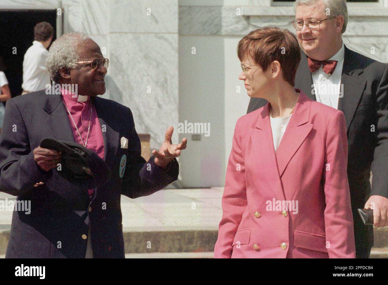 Archbishop Desmond Tutu, left, speaks with Emory University provost ...