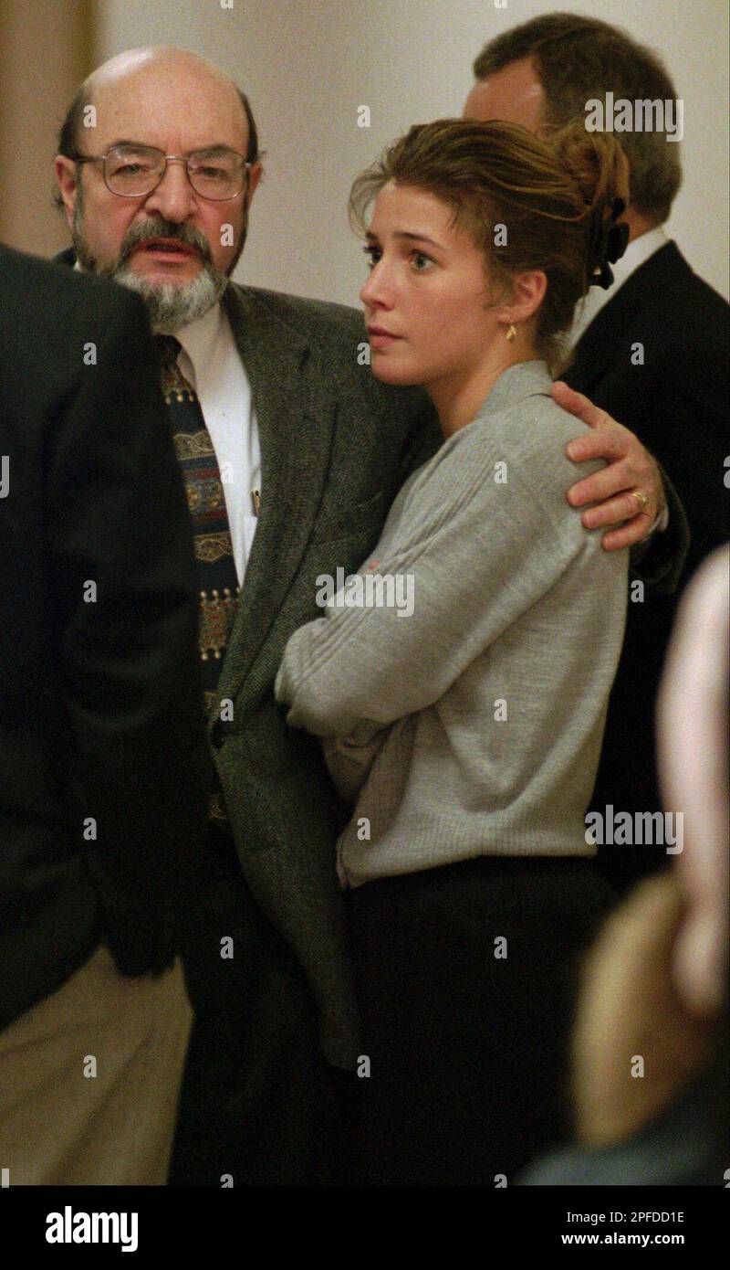 Audrey Iacona, right, and her dad, Mark, talk during a break in ...