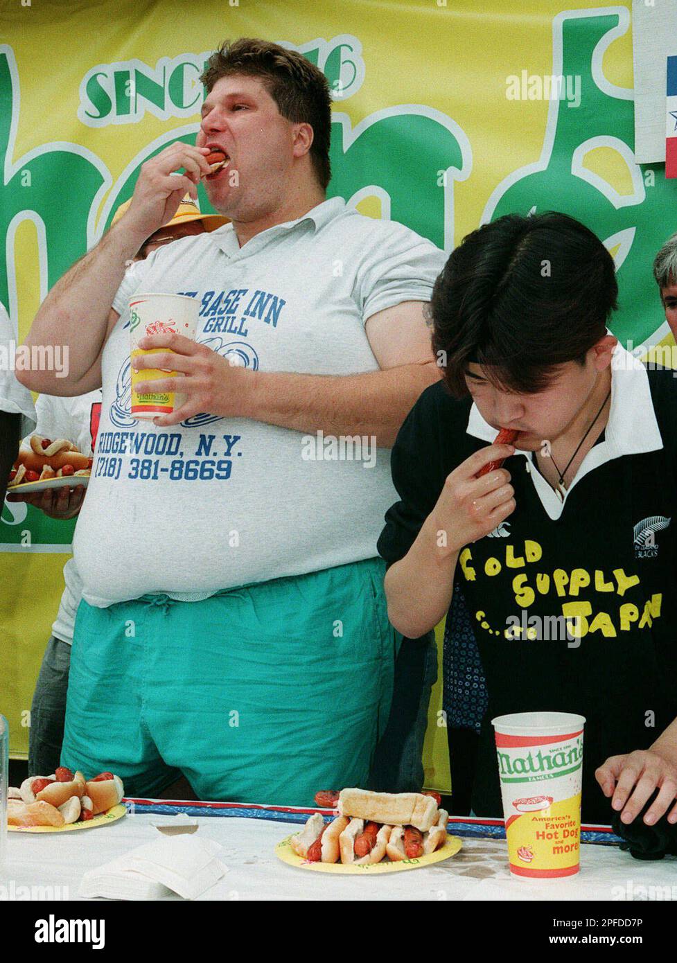 Three-time reigning world hot dog eating champion Hirofumi "The Tokyo ...