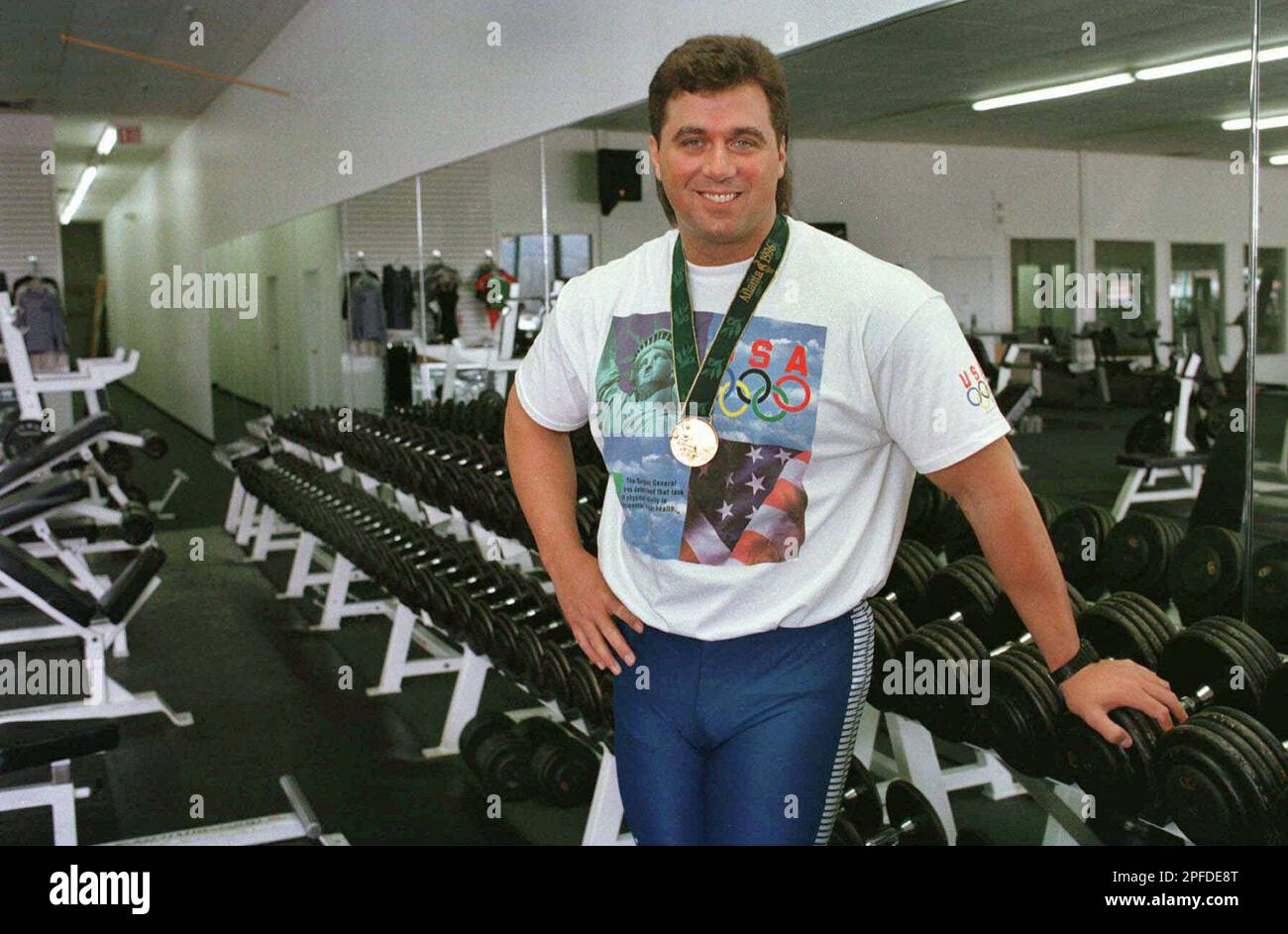 Randy Barnes of St. Albans, W.V., is shown here wearing his gold medal ...