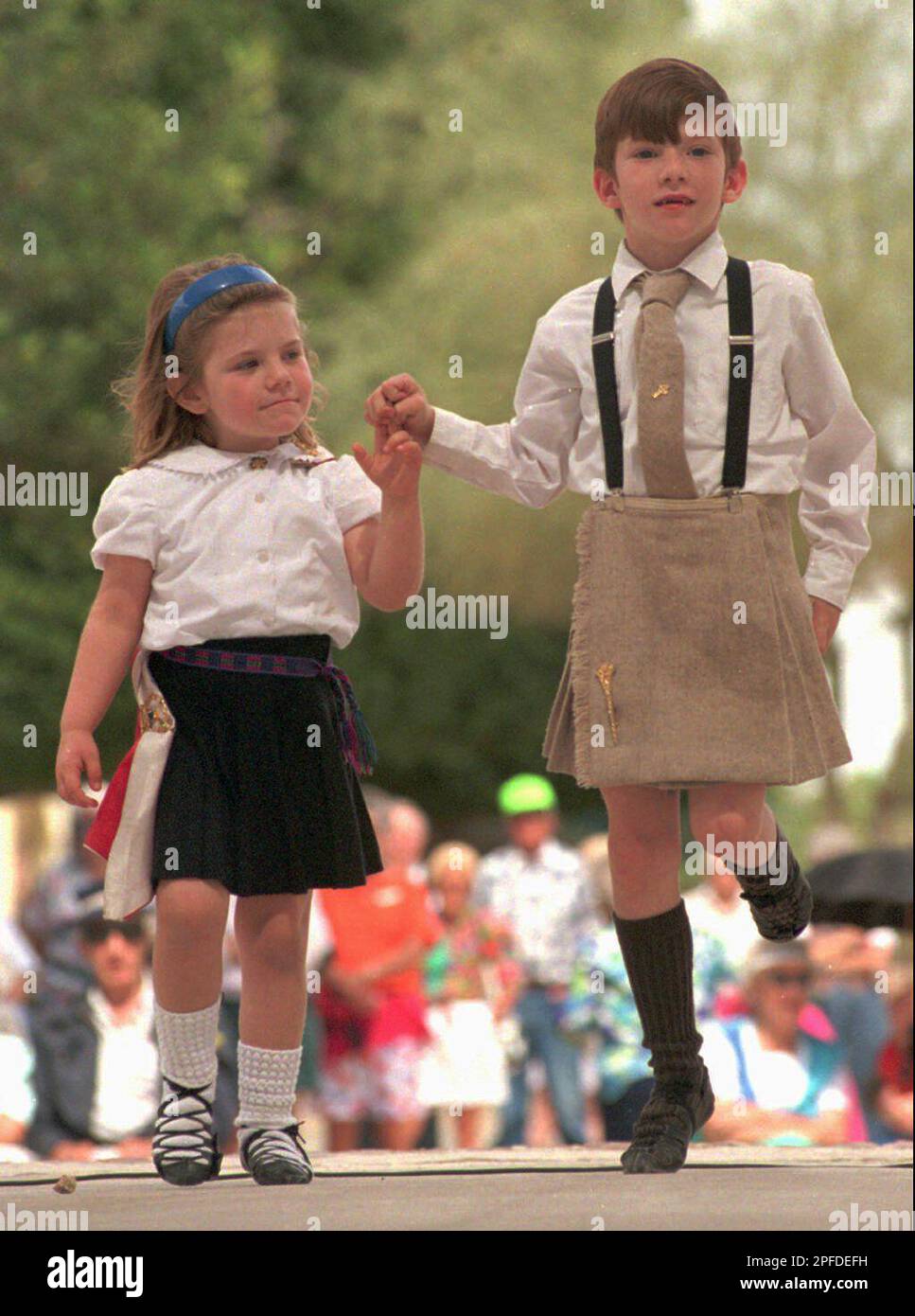 Beth Judd, 4, and her brother Ken, 7, perform a traditional Irish dance ...