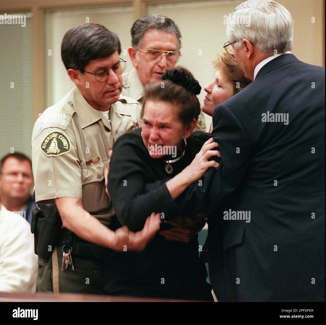 Maxine Kenny is restrained in a Riverside, Calif. courtroom Thursday ...