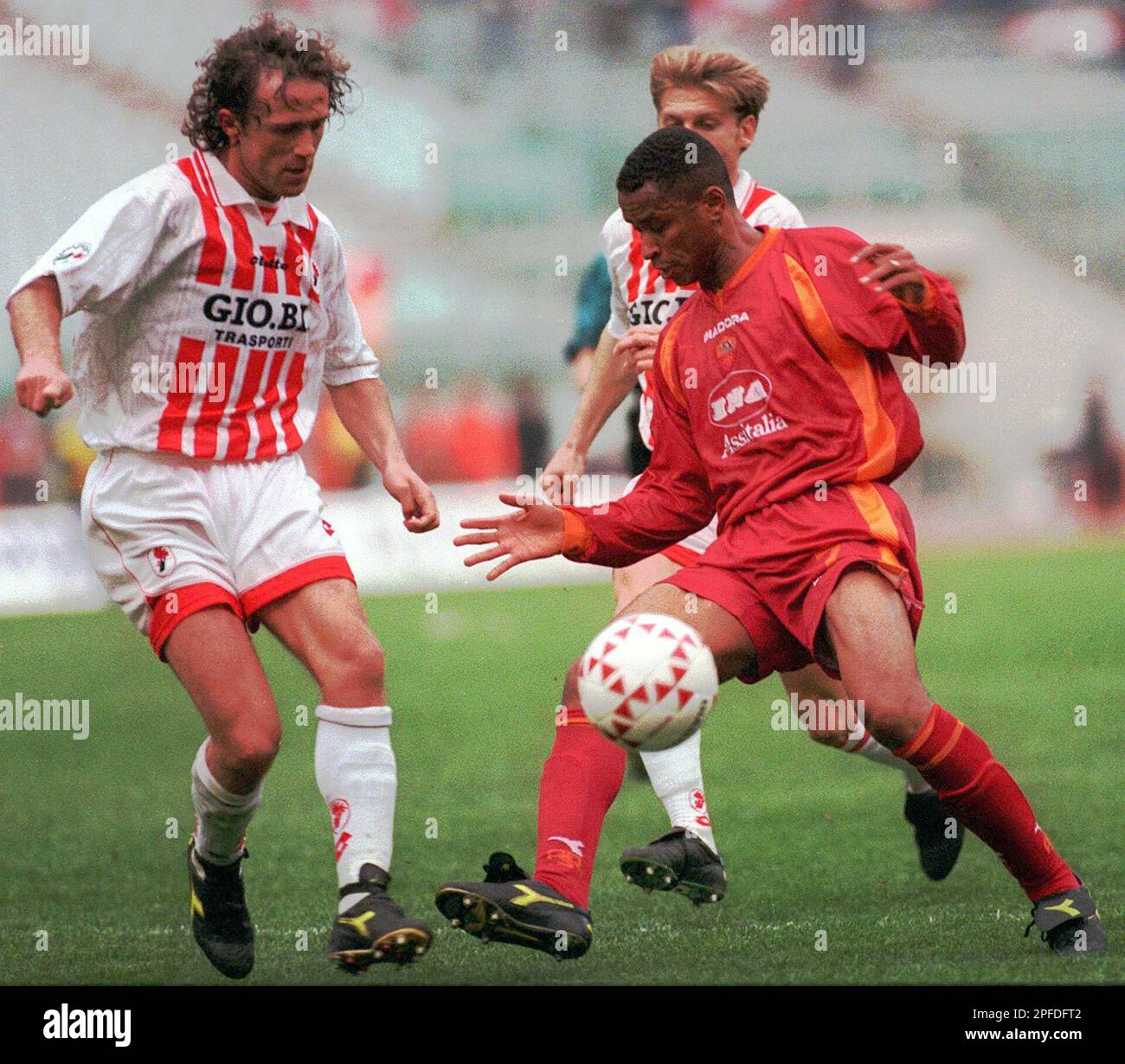 German Thomas Doll of Bari, left, challenges AS Roma's Brazilian ...