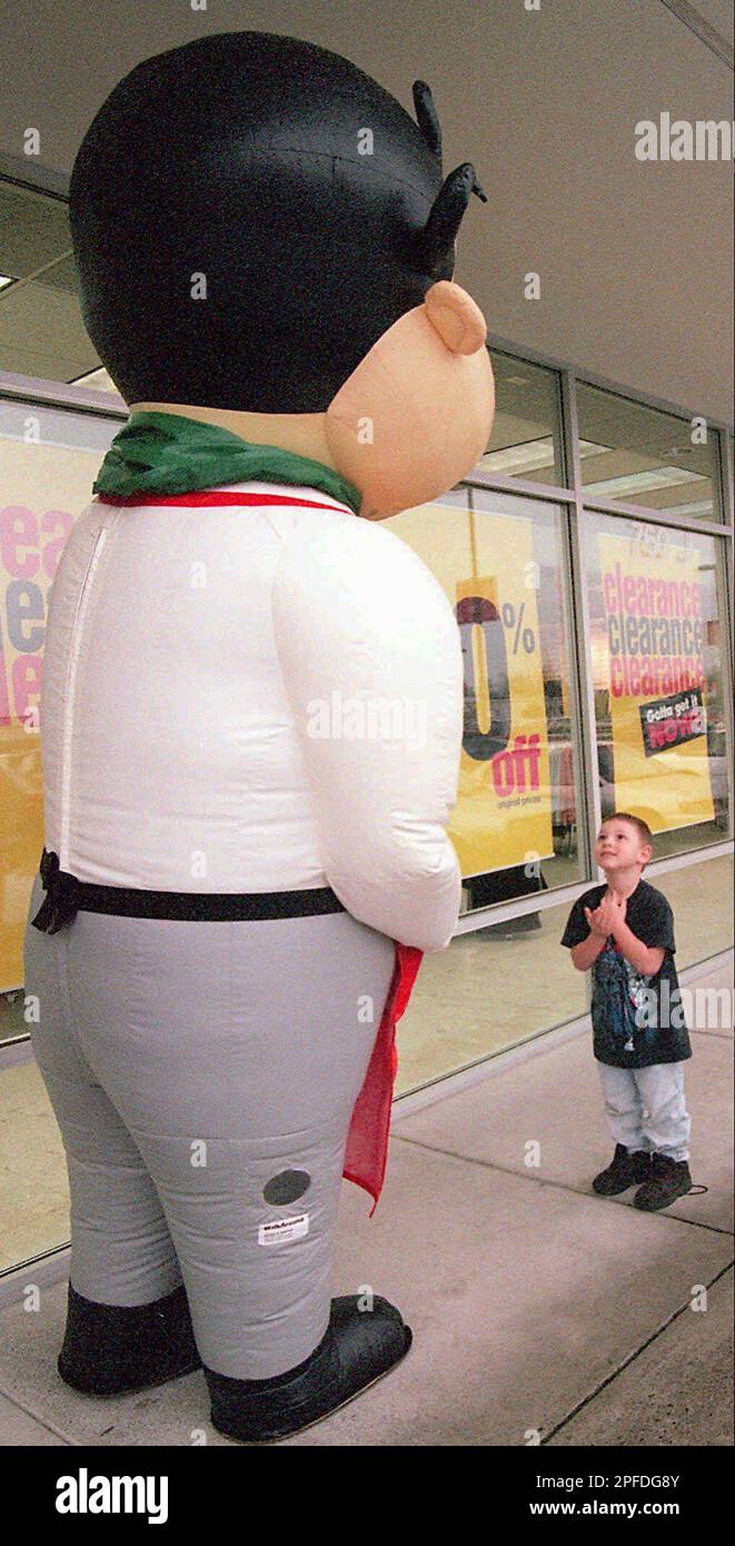 Matthew Burgy, 5, of Castle Rock, Wash. looks up in amazement at the ...