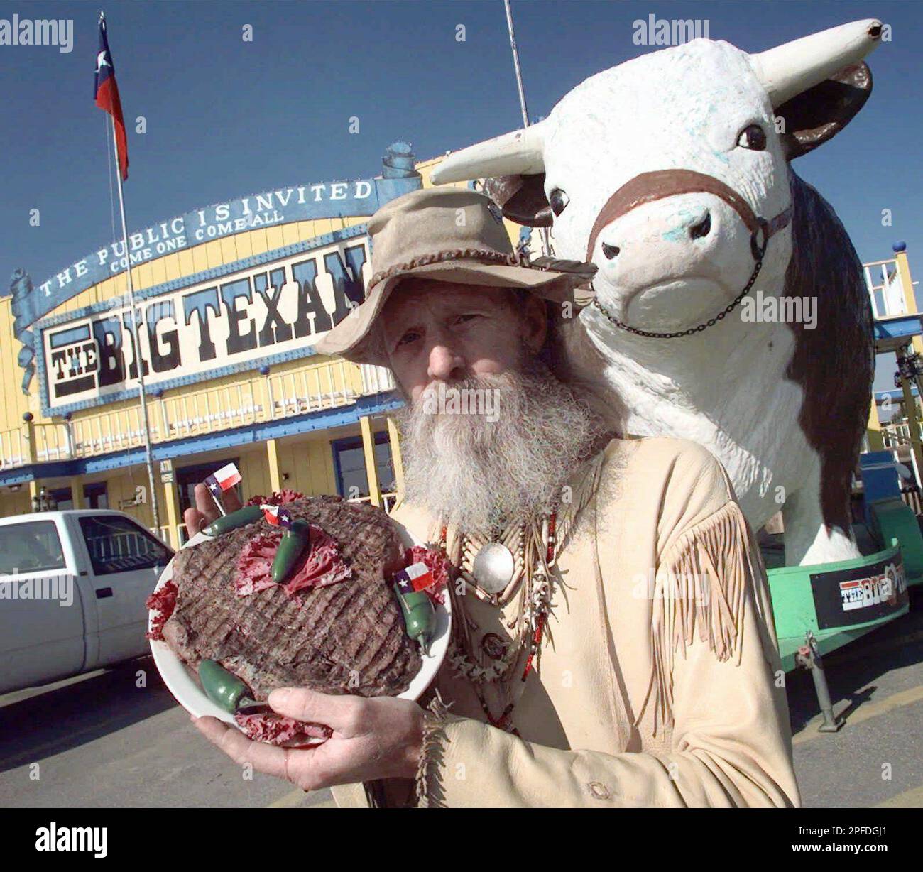 Hody Porterfield shows off the "World Famous" Big Texas Steak Ranch's ...
