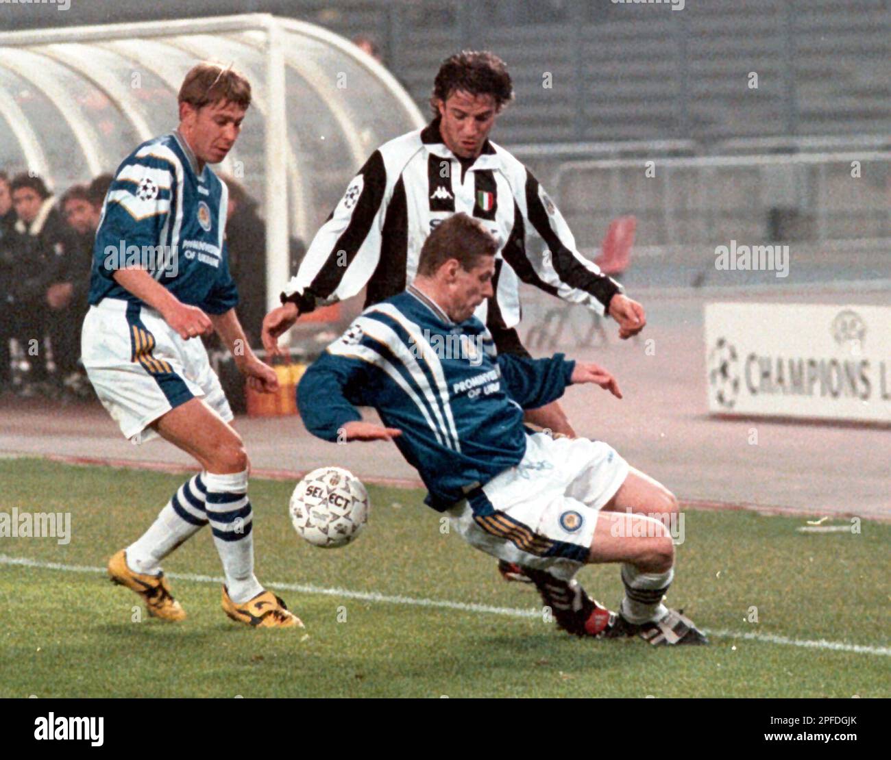 Alessandro del Piero of Juventus of Turin, behind right, is tackled by ...