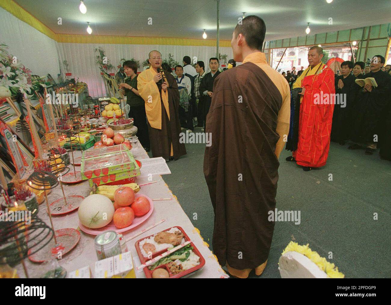 Buddhist priests and relatives of the Feb. 16 China Airlines plane ...