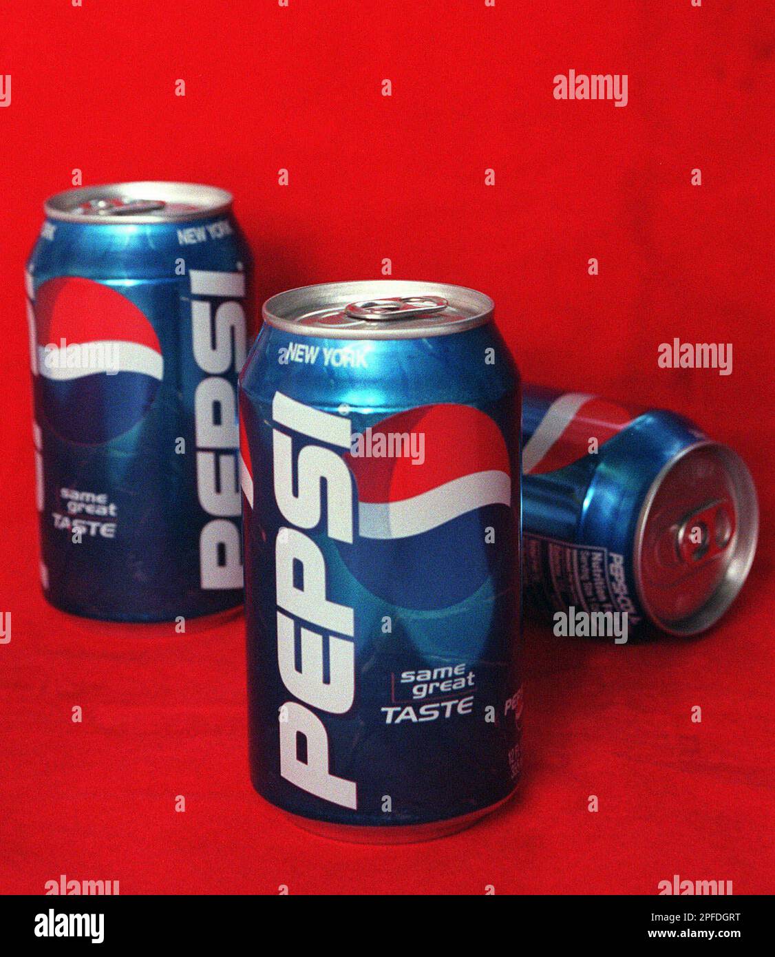 Pepsi Cola, in new blue cans with a redesigned logo, are shown in this ...