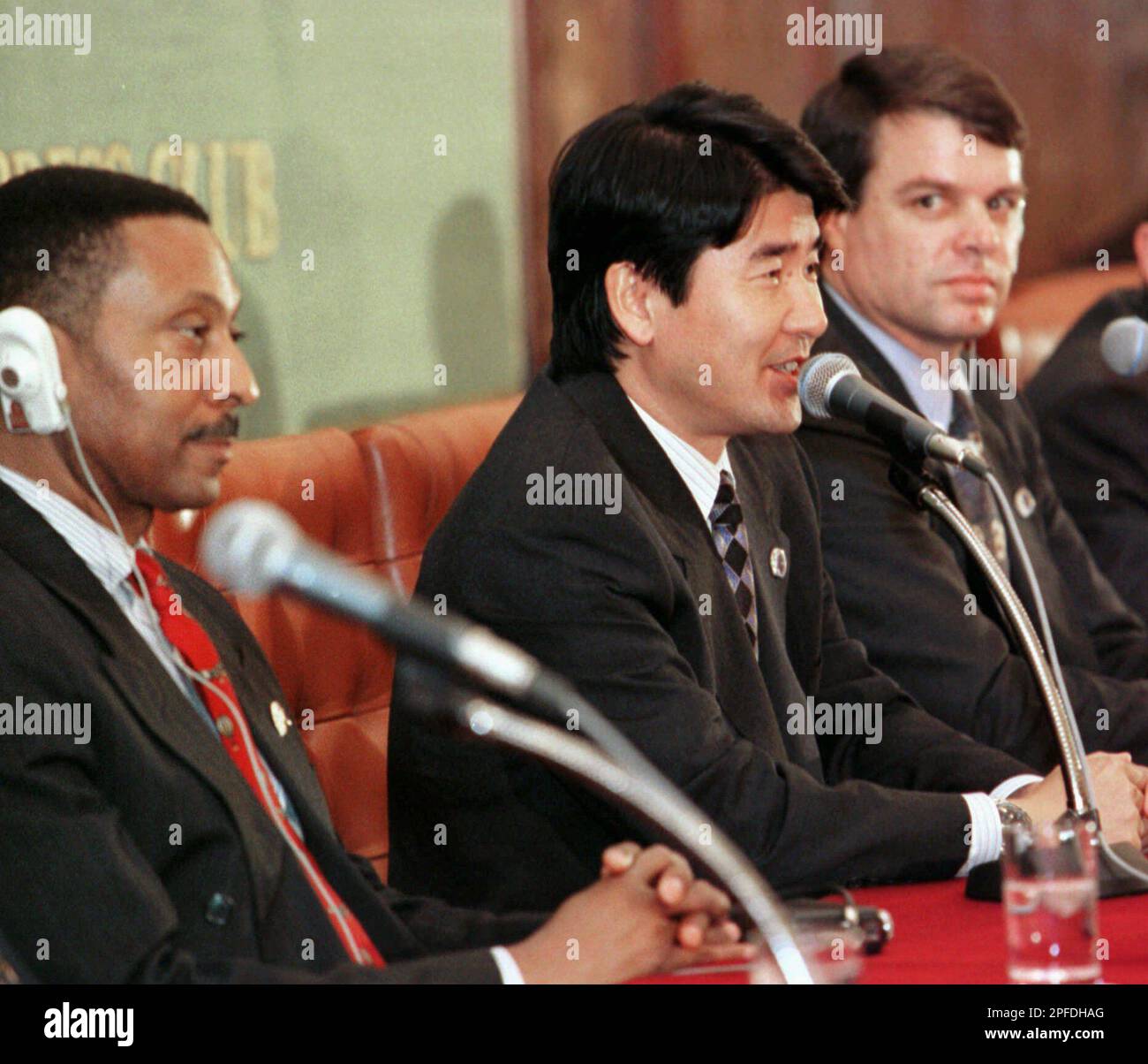 Takao Doi, center, the first Japanese to perform a spacewalk during his ...