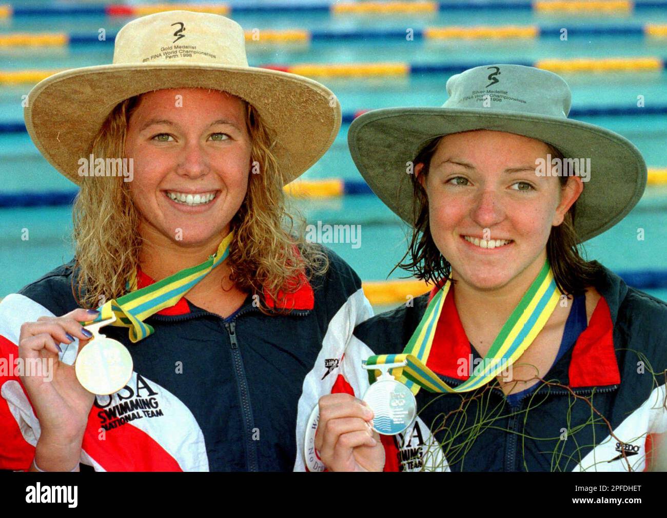 United States' Brooke Bennett, left, and Diana Munz show off their gold ...