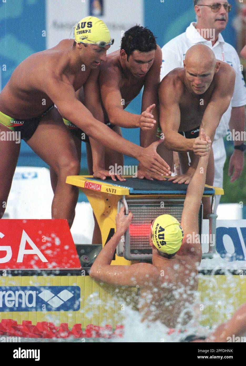 The Australian 4x200 meter relay team, left to right, Ian Thorpe, Grant Hackett, Michael Klim ...