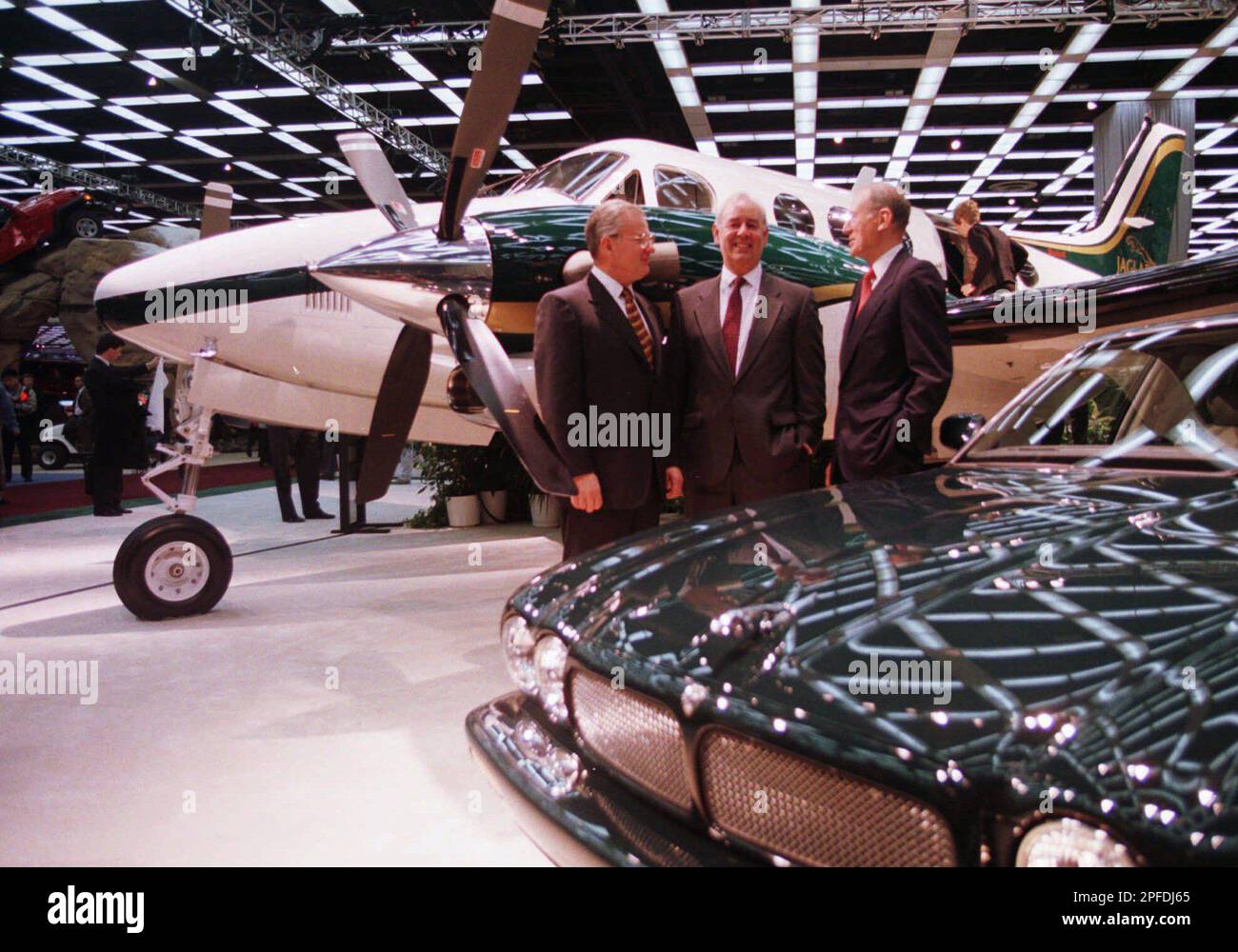 Arthur Wegner, left, CEO of Raytheon, Nick Scheele, center, CEO of ...