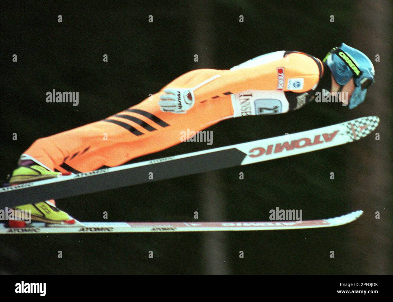 Janne Ahonen of Finland soars through the air to take the third place ...